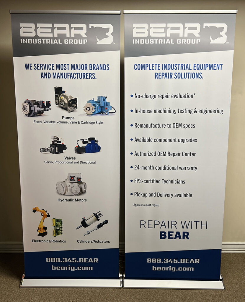 Visual Impact Systems Produces Retractable Banners for Axis CrossMedia ...
